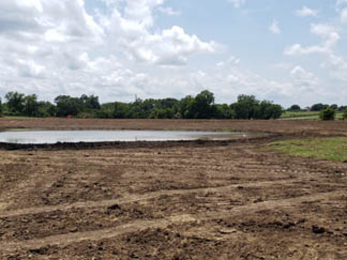 Retention Pond Builder, Detention Pond Builder | Iola, Bedias, College ...